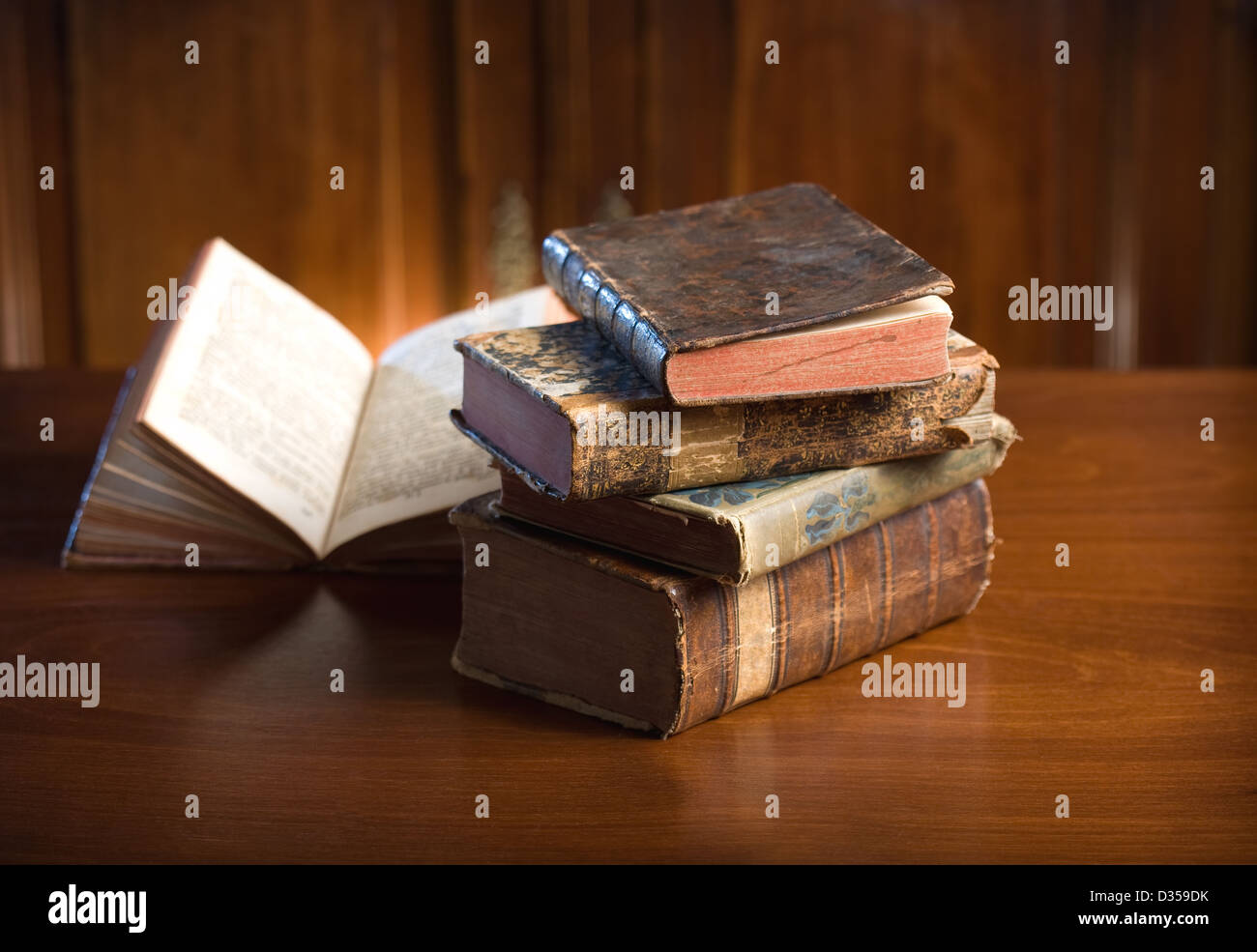 Beautiful antique books in very elegant setting Stock Photo - Alamy
