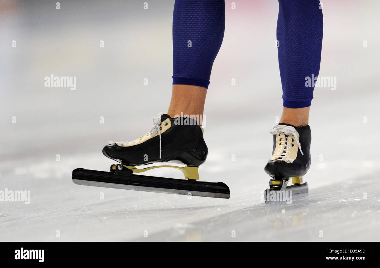 The ice skates of an athlete are seen during the Speed Skating World ...