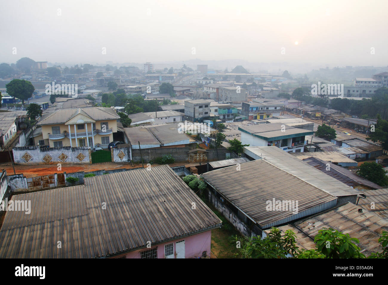 Early morning lights on a typical central African metropolis ...