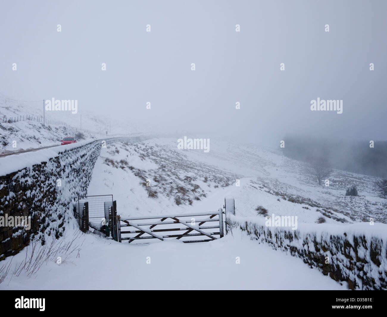 Snow blizzard on Holmfirth road,Saddleworth, England, UK Stock Photo ...