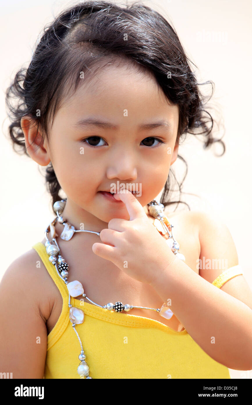 Portrait of the beautiful small Asian girl. Indonesia. Java Stock Photo ...