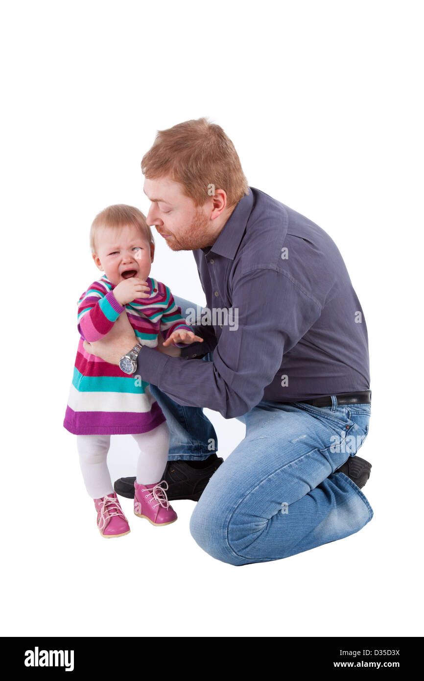 Father calms his small crying daughter, isolated on white Stock Photo ...