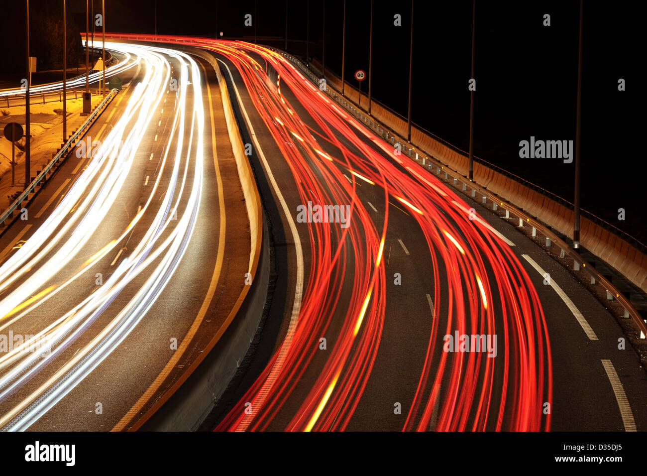 Traffic light trails on dual carriageway at night Stock Photo - Alamy