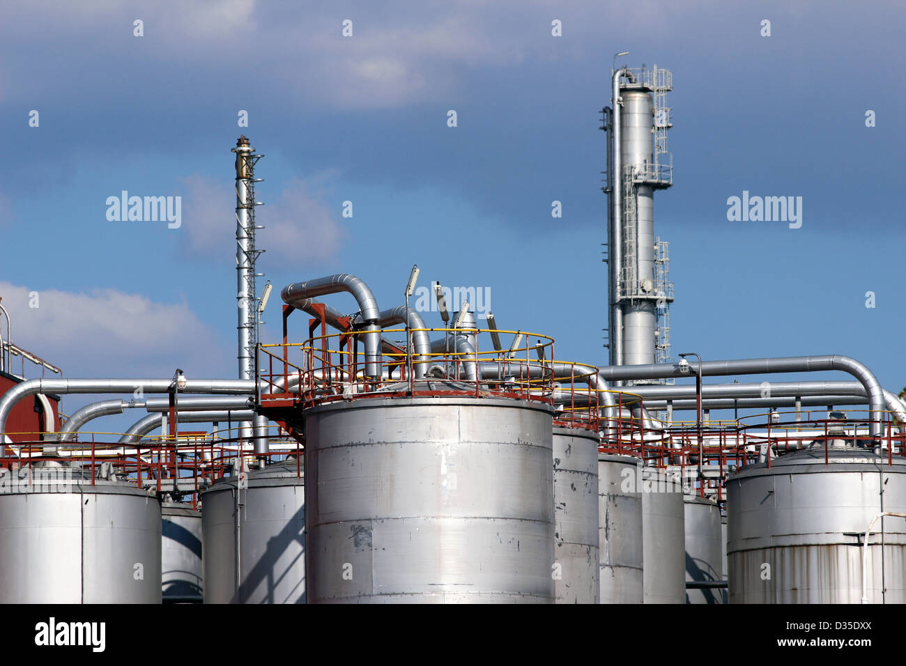 steel tanks and pipe in oil refinery Stock Photo - Alamy