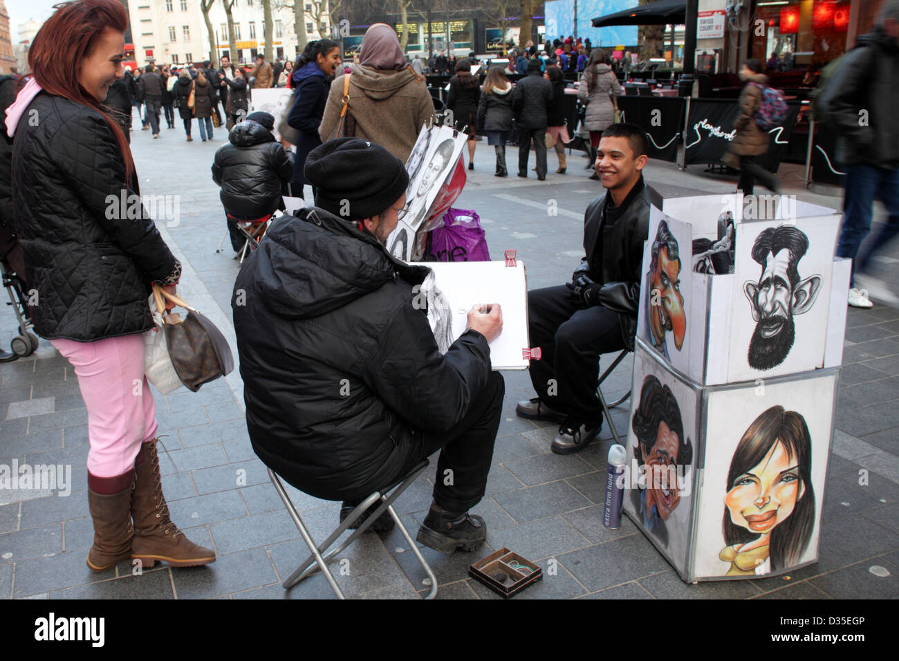 A street artist who makes drawn caricatures of people, London's West ...
