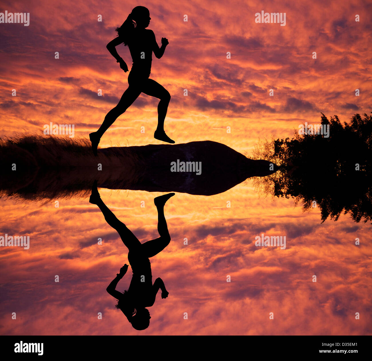 Female runner silhouette against the sunset Stock Photo - Alamy