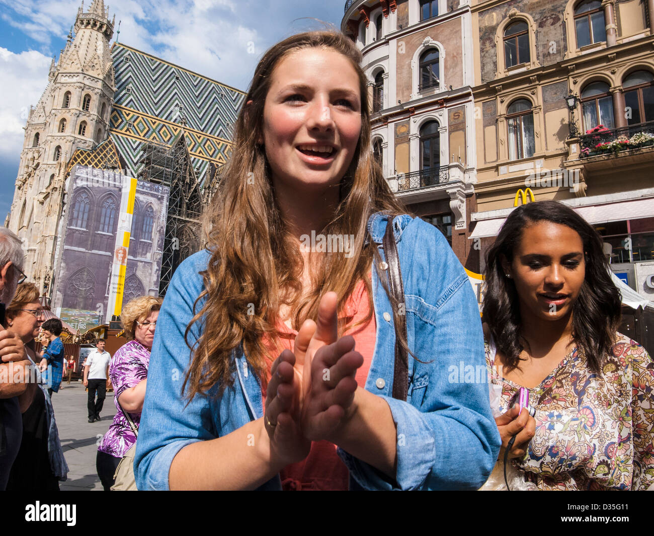 Two smiling girls in central Vienna Stock Photo - Alamy