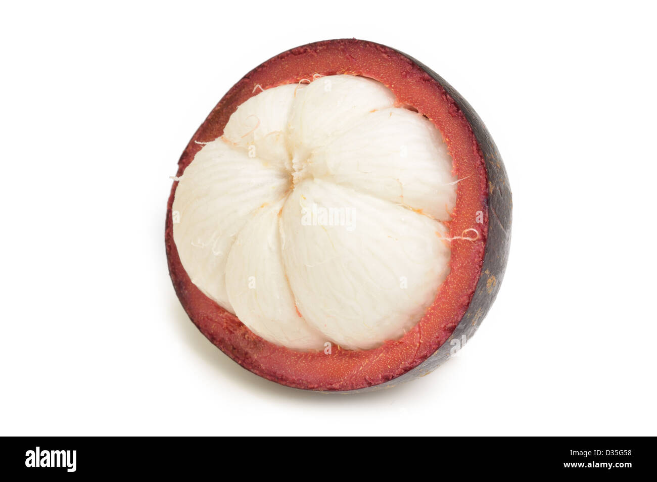 Purple mangosteen on a white background close-up Stock Photo - Alamy