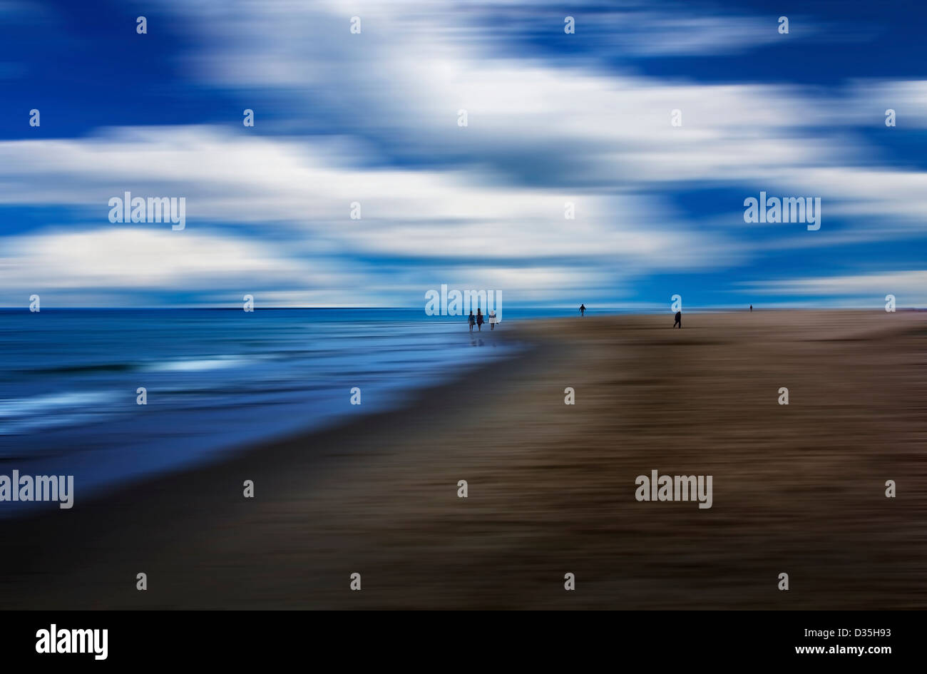 Scenic view with distorted landscape and sky with silhouetted figures ...