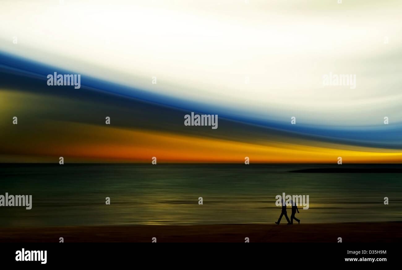 Scenic view with distorted landscape and sky with silhouetted figures ...