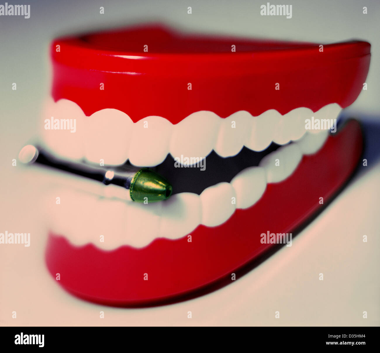 Bite the bullet hi-res stock photography and images - Alamy