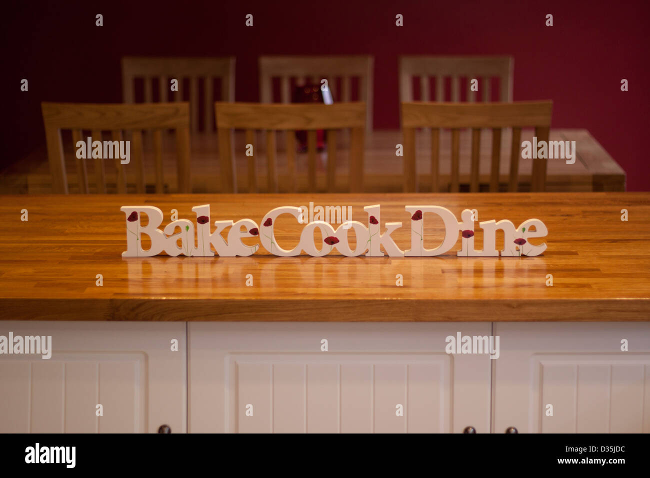 Bake, cook and dine signs in the kitchen Stock Photo - Alamy