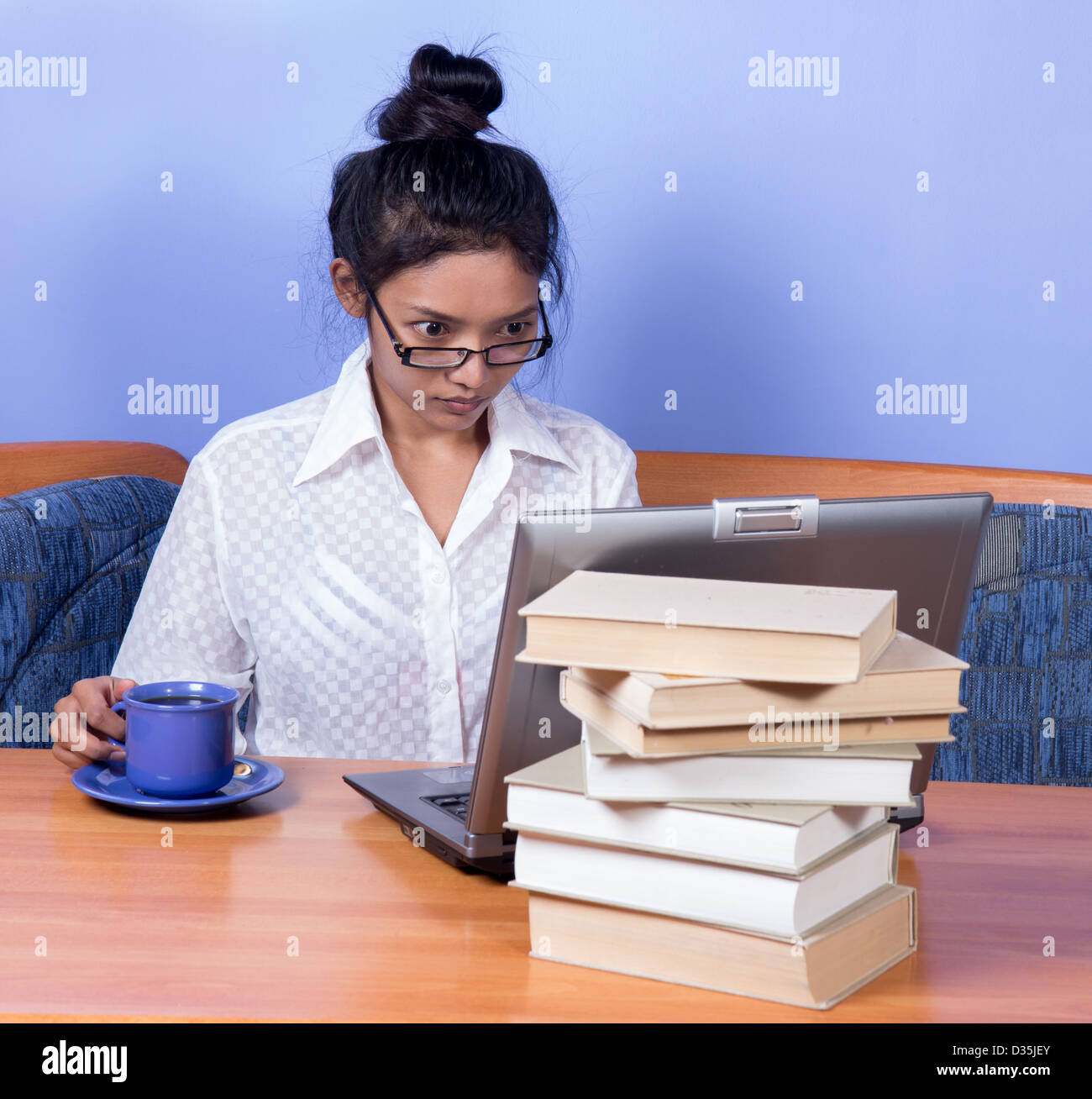 Young woman working with computer Stock Photo - Alamy