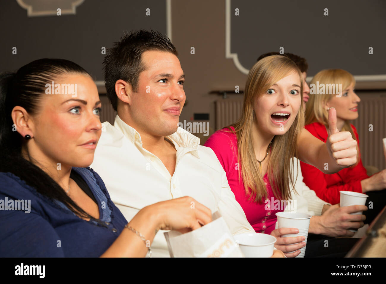 Audience clapping in movie theater hi-res stock photography and images ...