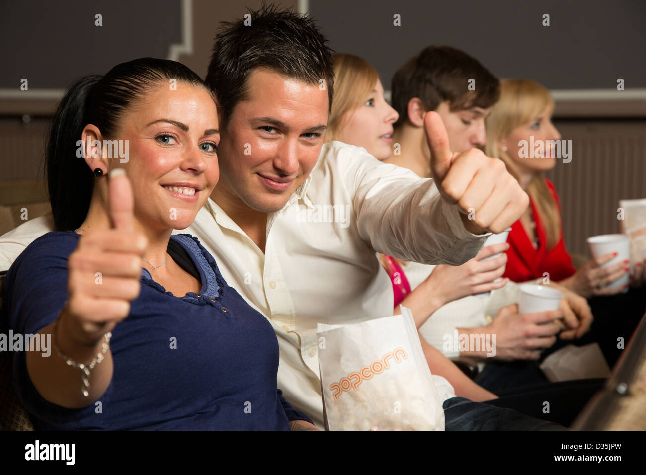 Audience clapping in movie theater hi-res stock photography and images ...