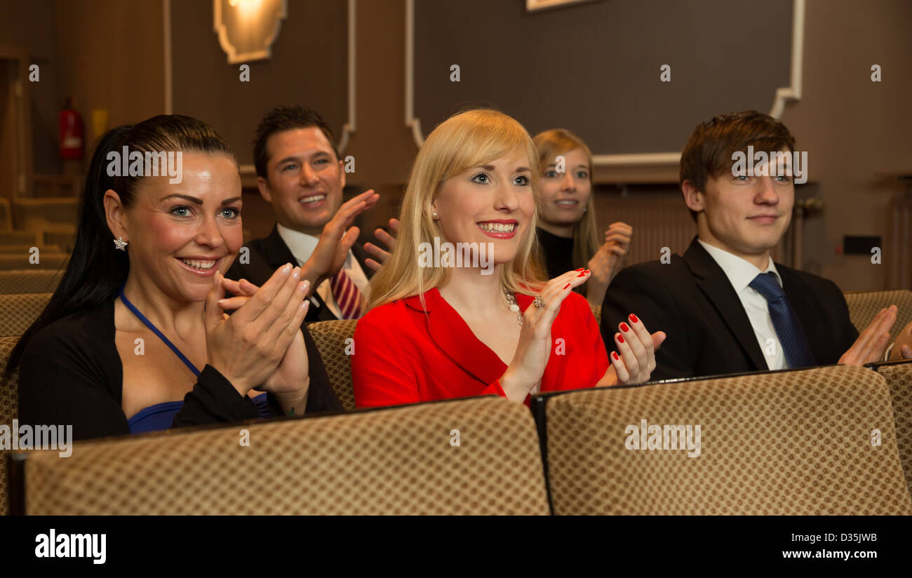 Audience clapping in movie theater hi-res stock photography and images ...