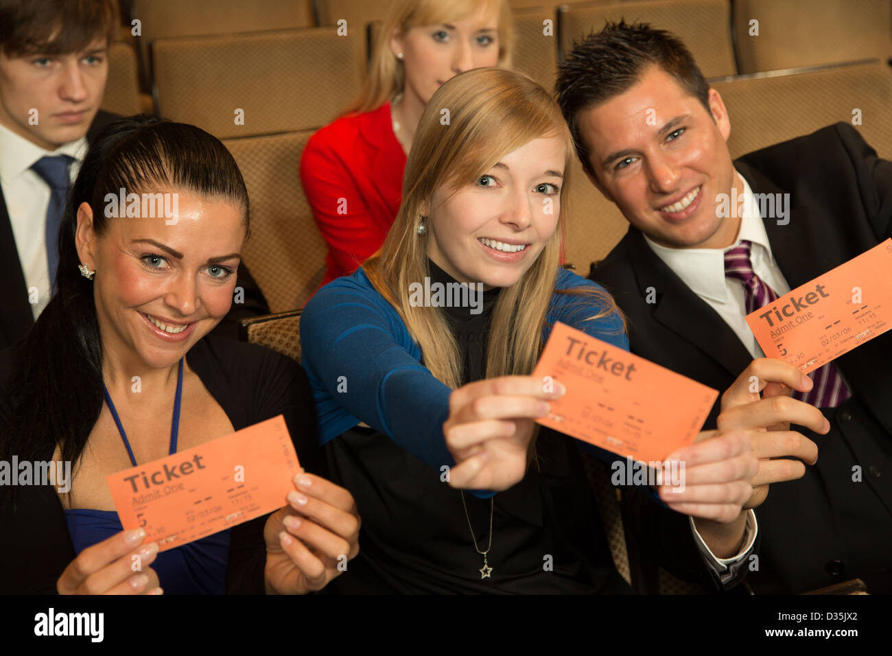 Group of audience members in a theatre, on a concert or in a cinema ...