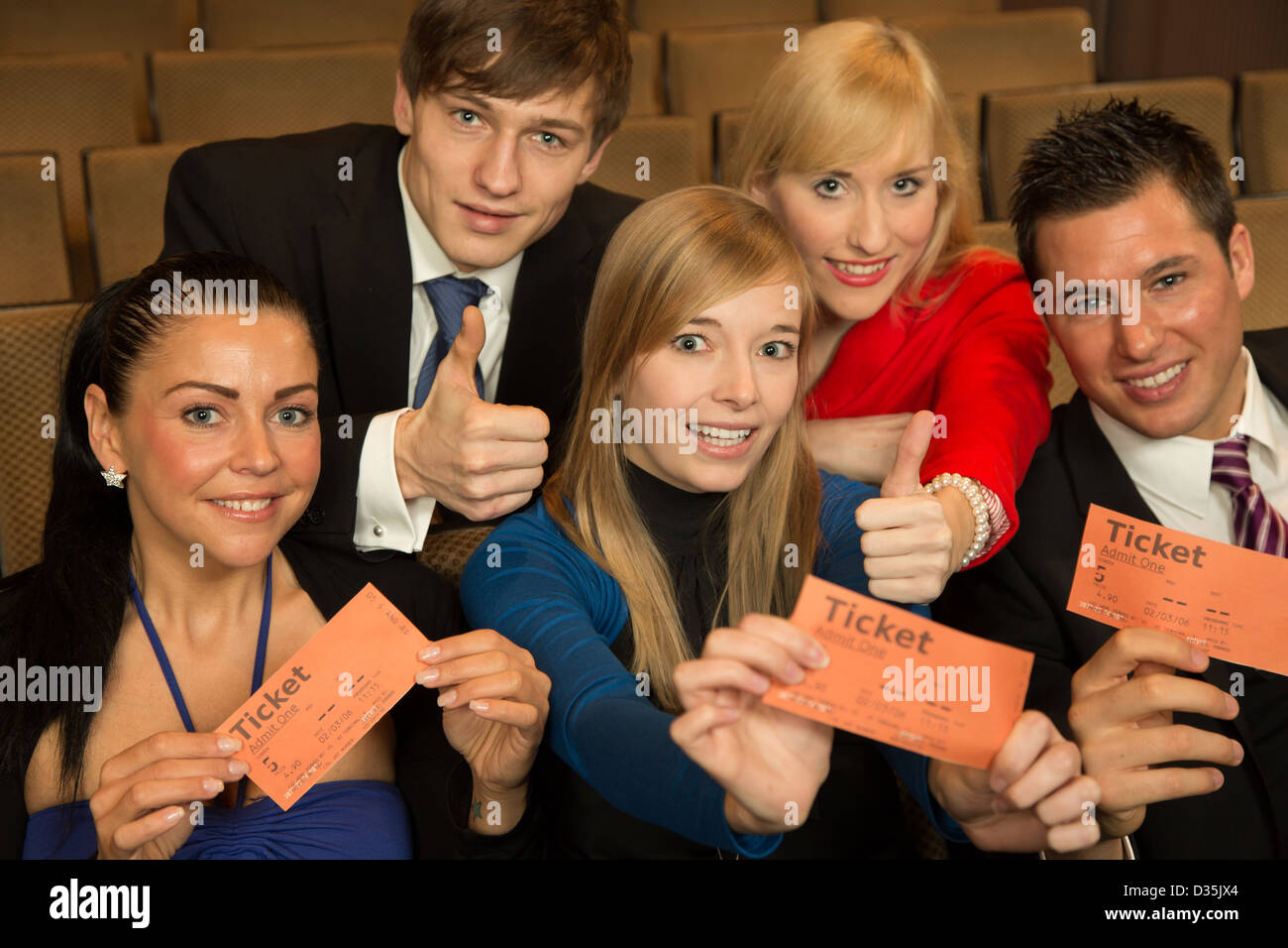 Group of audience members in a theatre, on a concert or in a cinema ...
