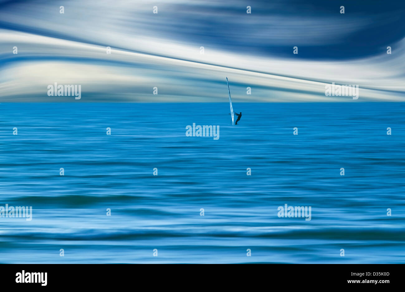 Scenic view with distorted landscape and sky with silhouetted figures ...