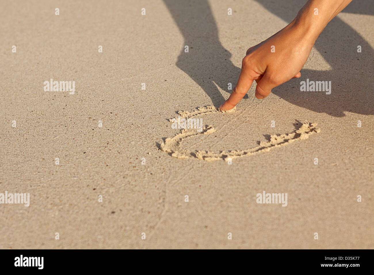 hand writing in sand in summer holiday vacation on beach Stock Photo ...