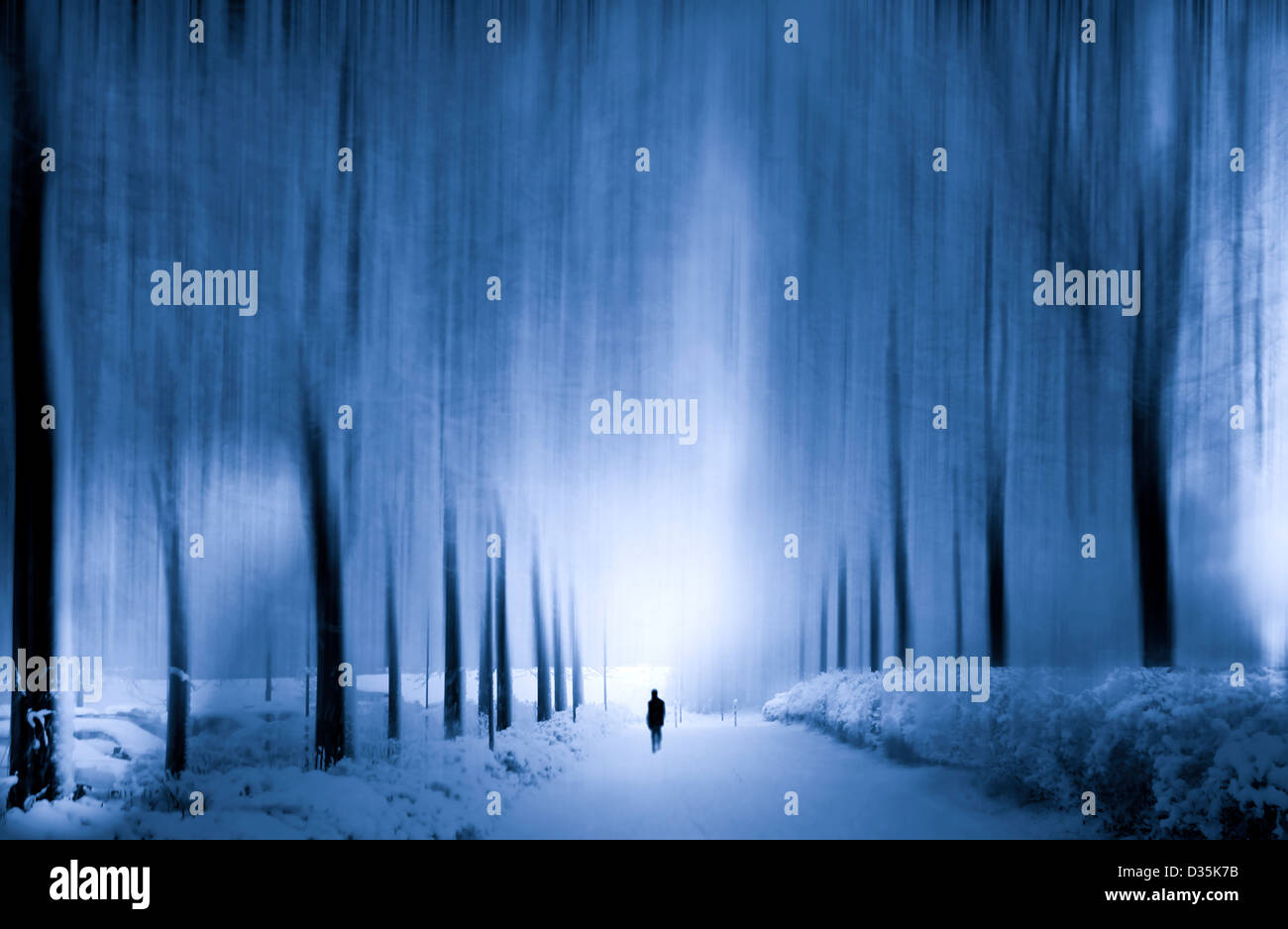 Scenic view with distorted landscape and sky with silhouetted figures ...