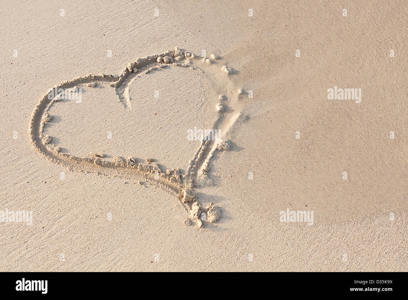 hand writing in sand in summer holiday vacation on beach Stock Photo ...