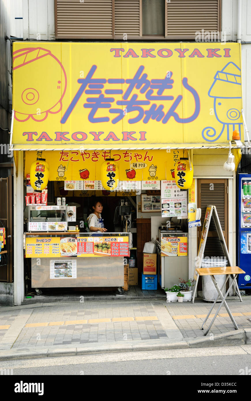 Small snack stall, with owner Stock Photo - Alamy