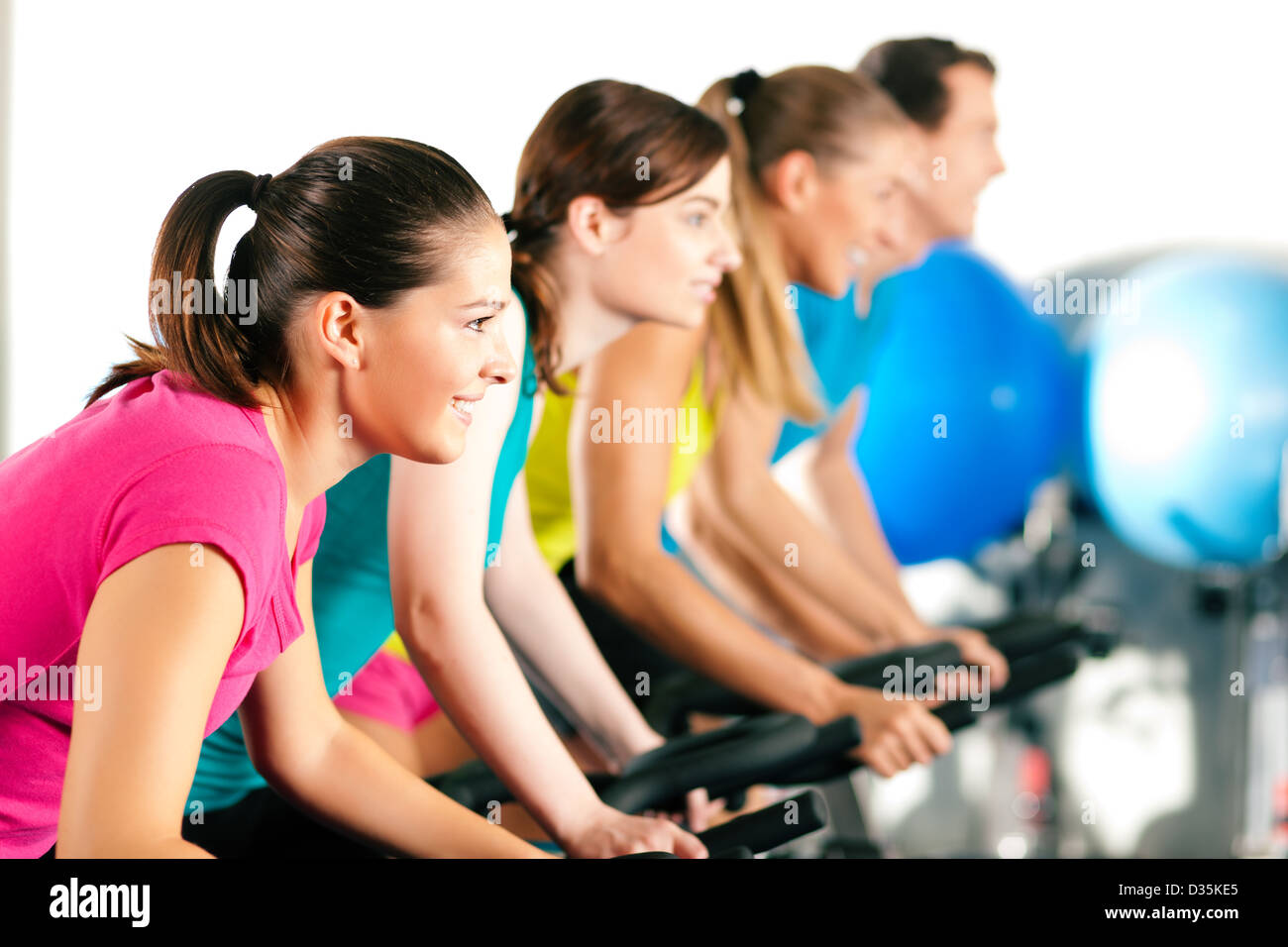 Group four people spinning hi-res stock photography and images - Alamy