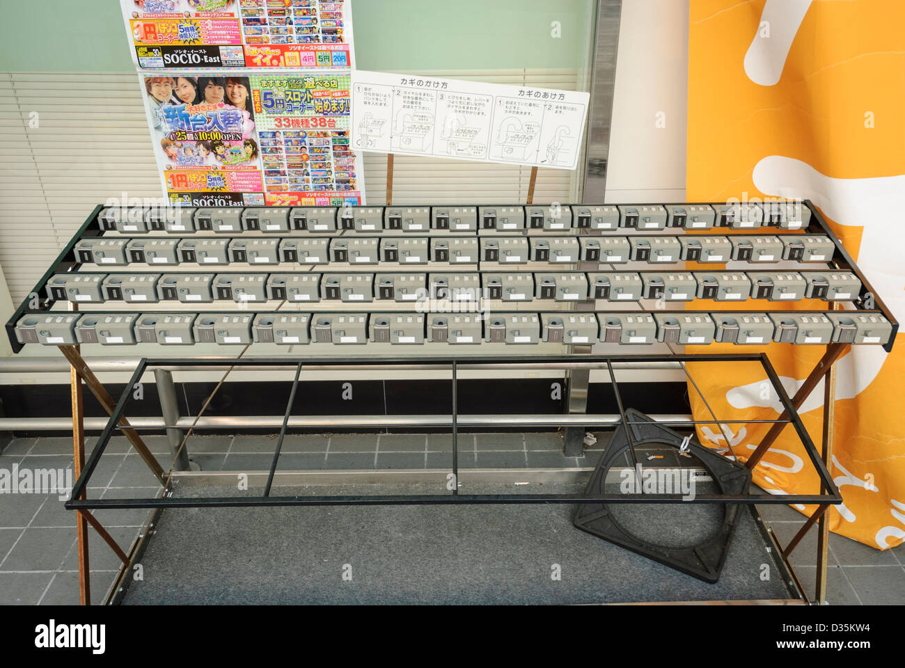 Uniquely Japanese contraption: an umbrella rack Stock Photo - Alamy