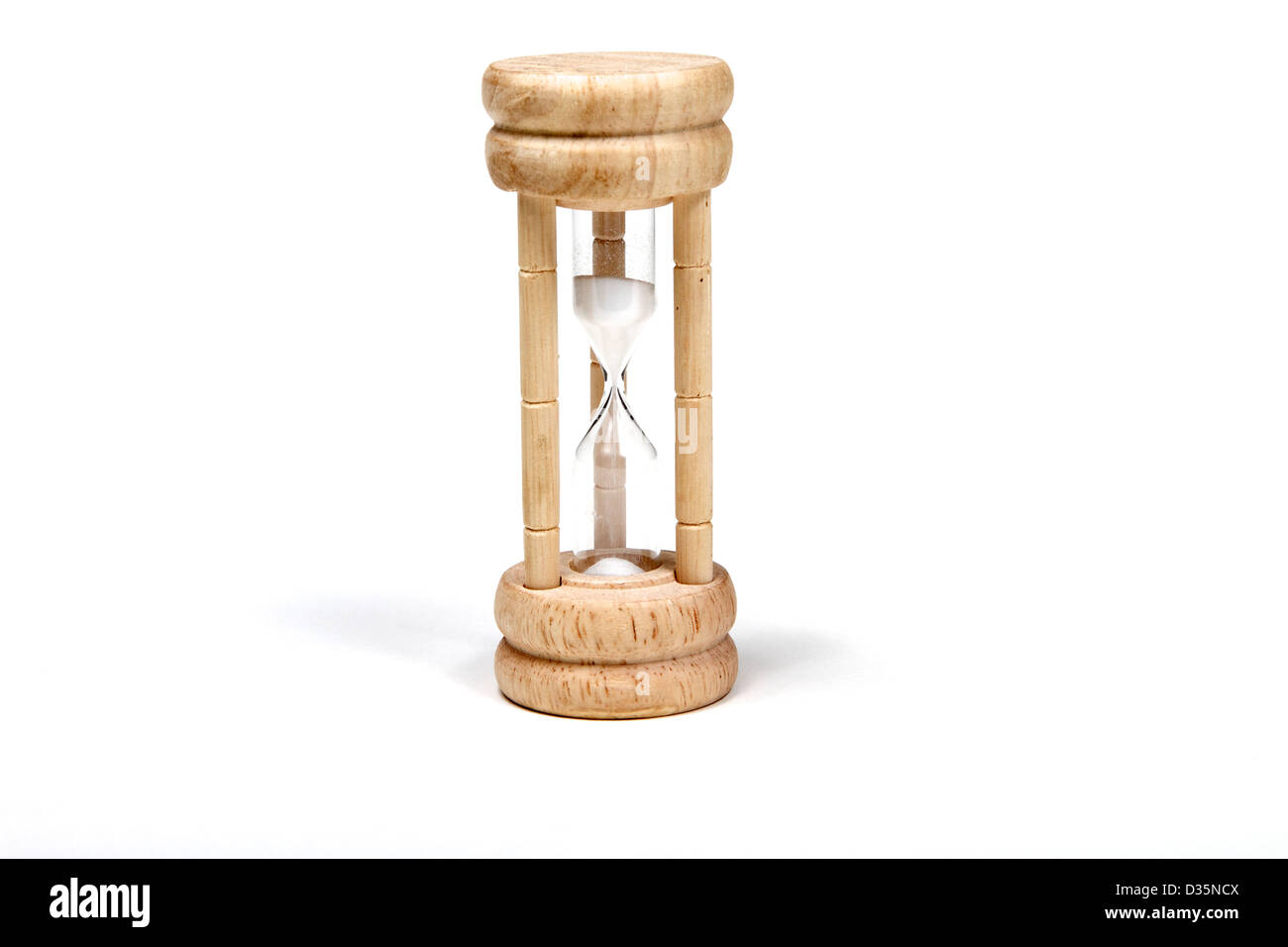 Wooden hourglass timer on a white background Stock Photo - Alamy