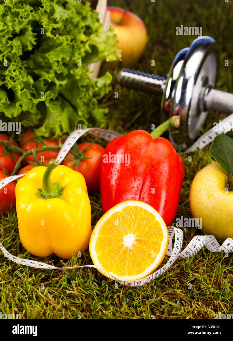 Fitness diet,vegetables and fruits on green grass Stock Photo - Alamy