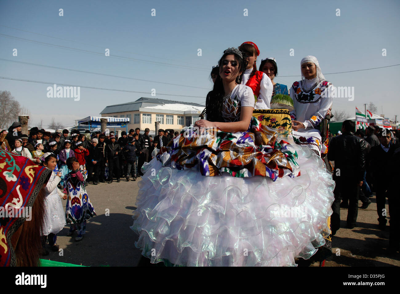 Girls in ethnic dresses at a Navruz celebration near Dushanbe ...