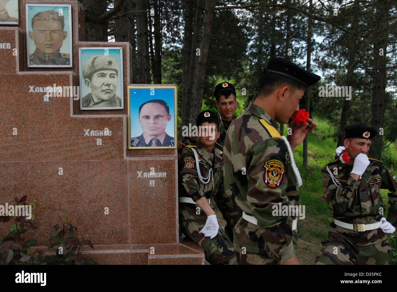 Tajik soldiers with carnations at a Soviet Veteran's day celebration in ...