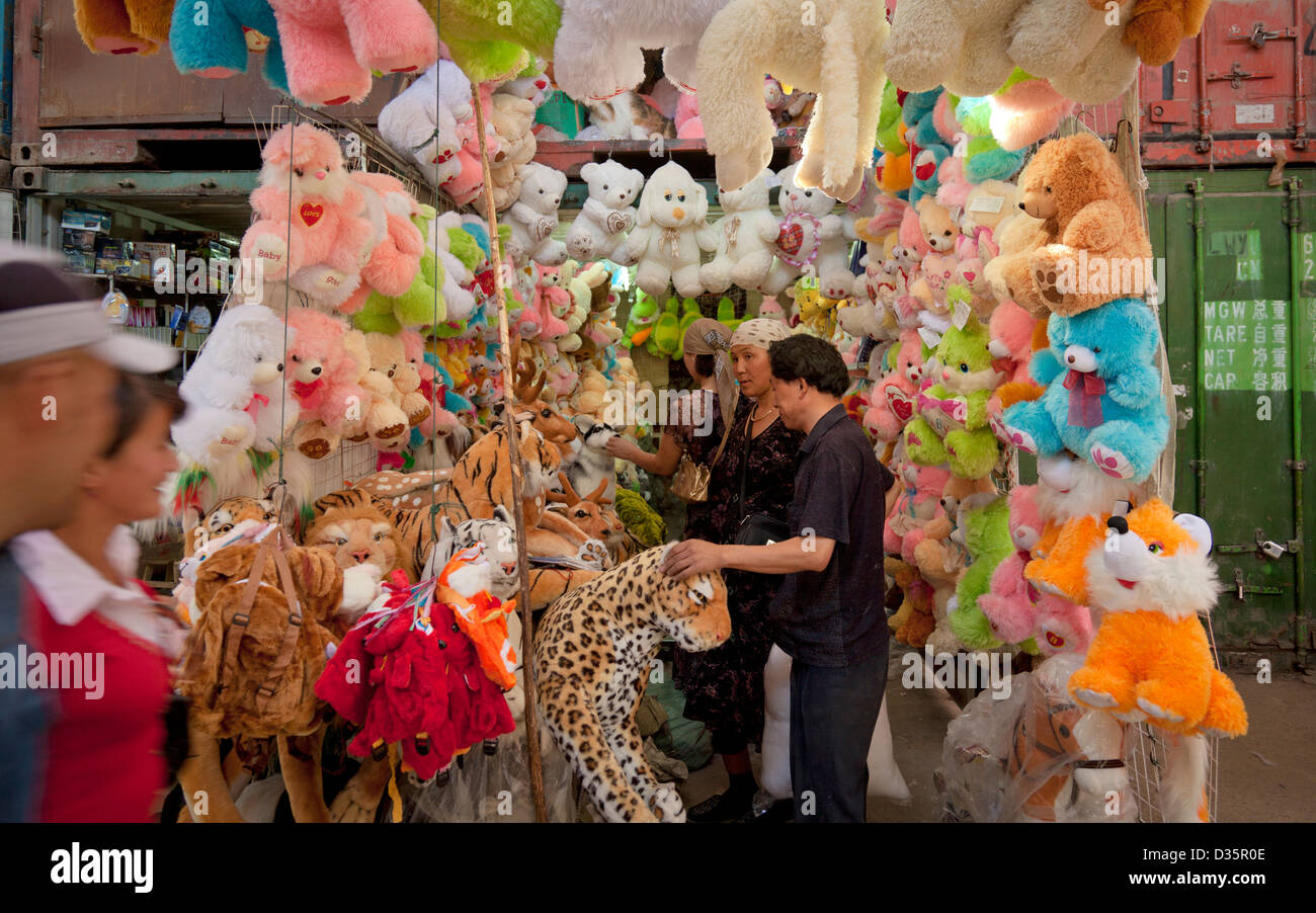 Chinese merchants selling items from shipping containers in Karasuu ...