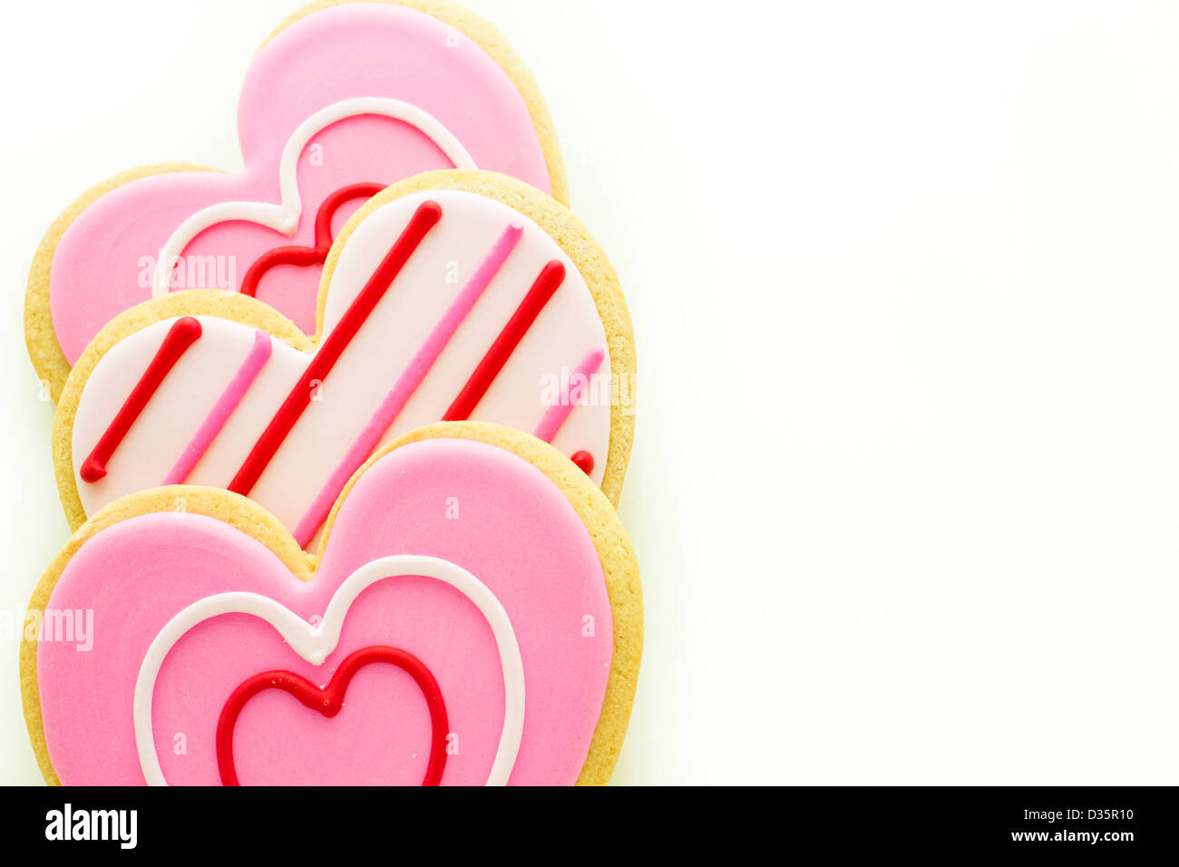 Heart shaped cookies decorated fancy icing patterns Stock Photo - Alamy