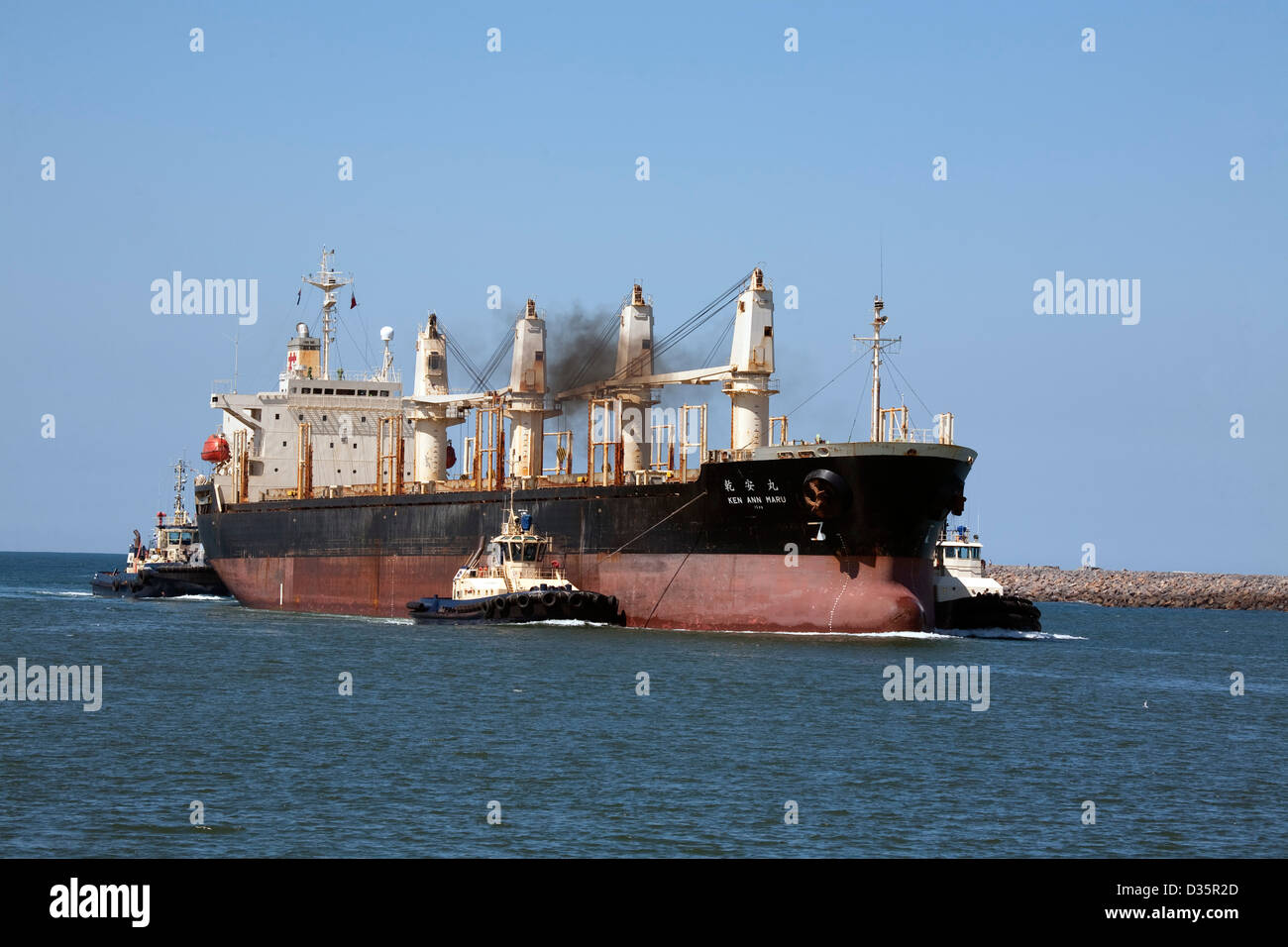 MV Ken Ann Maru Dry Cargo Carrier arriving in Newcastle Australia with the assistance of three ...