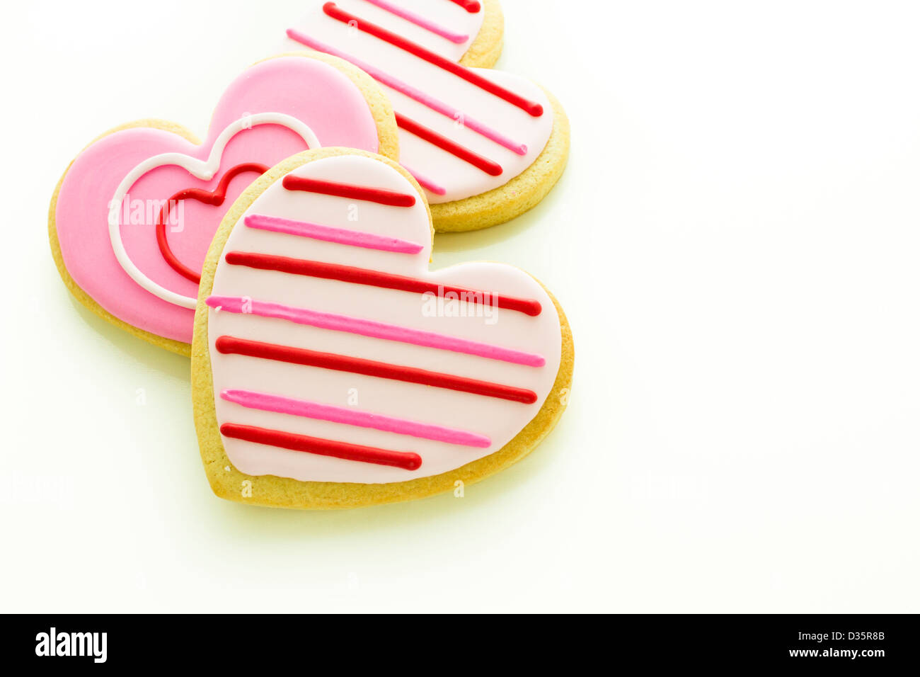 Heart shaped cookies decorated fancy icing patterns Stock Photo - Alamy