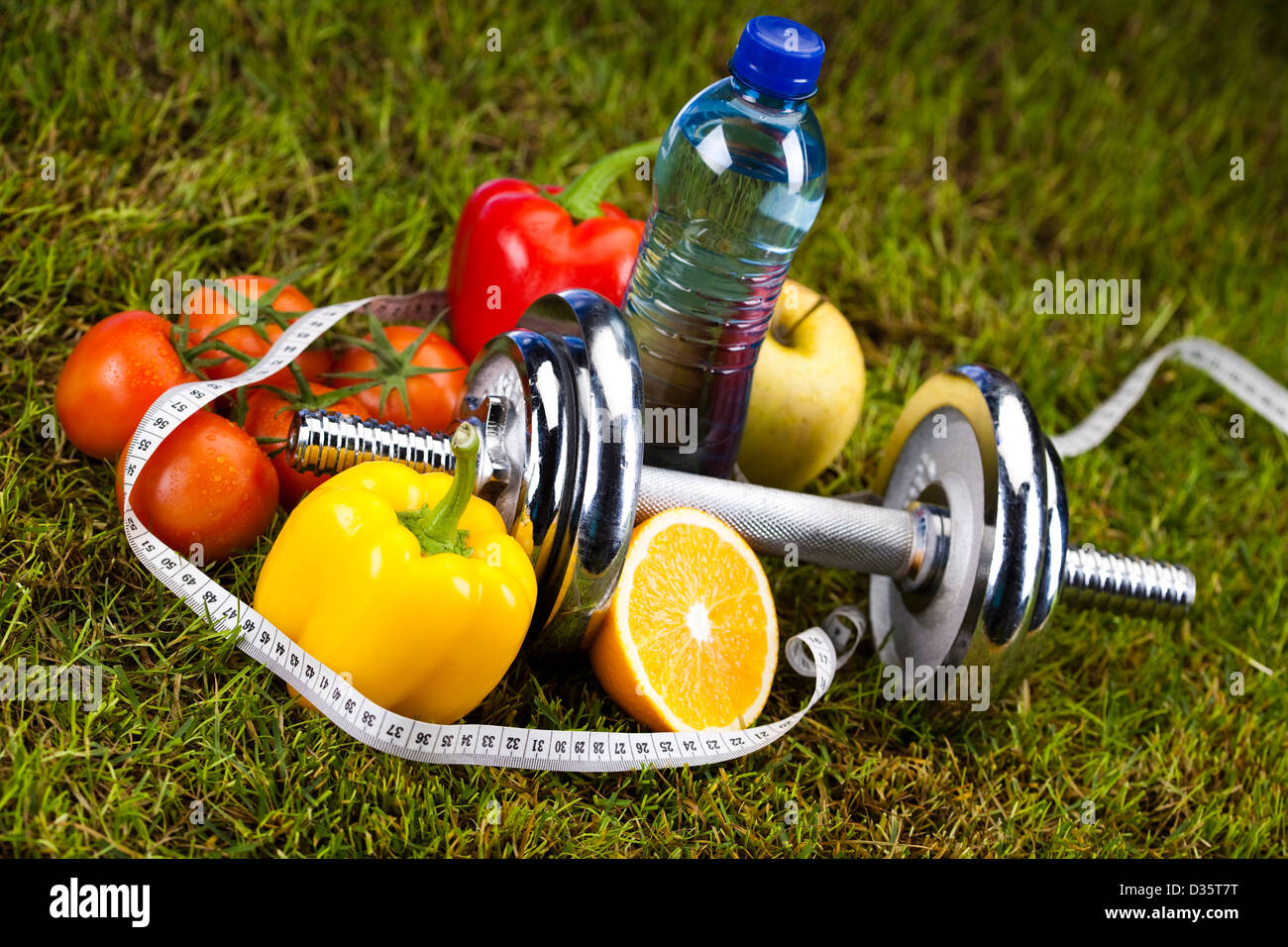Fitness diet,vegetables and fruits on green grass Stock Photo - Alamy