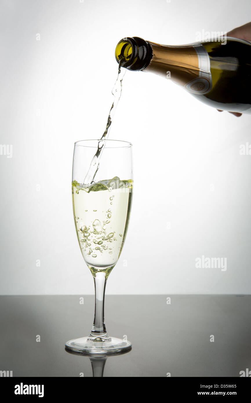 Hand pouring filling champagne hi-res stock photography and images - Alamy