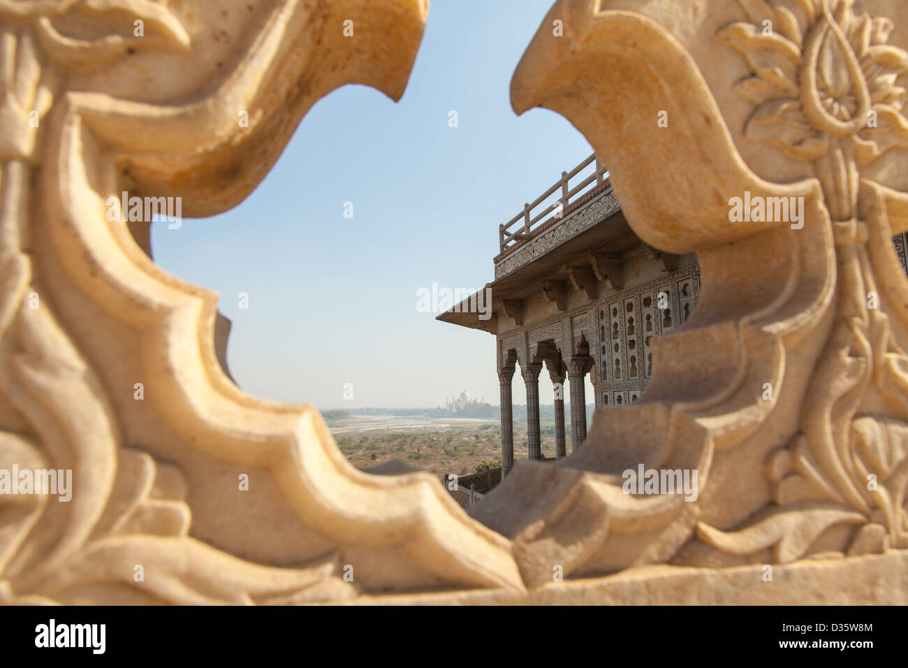 The Agra Fort window with the Taj Mahal in the far background Stock ...