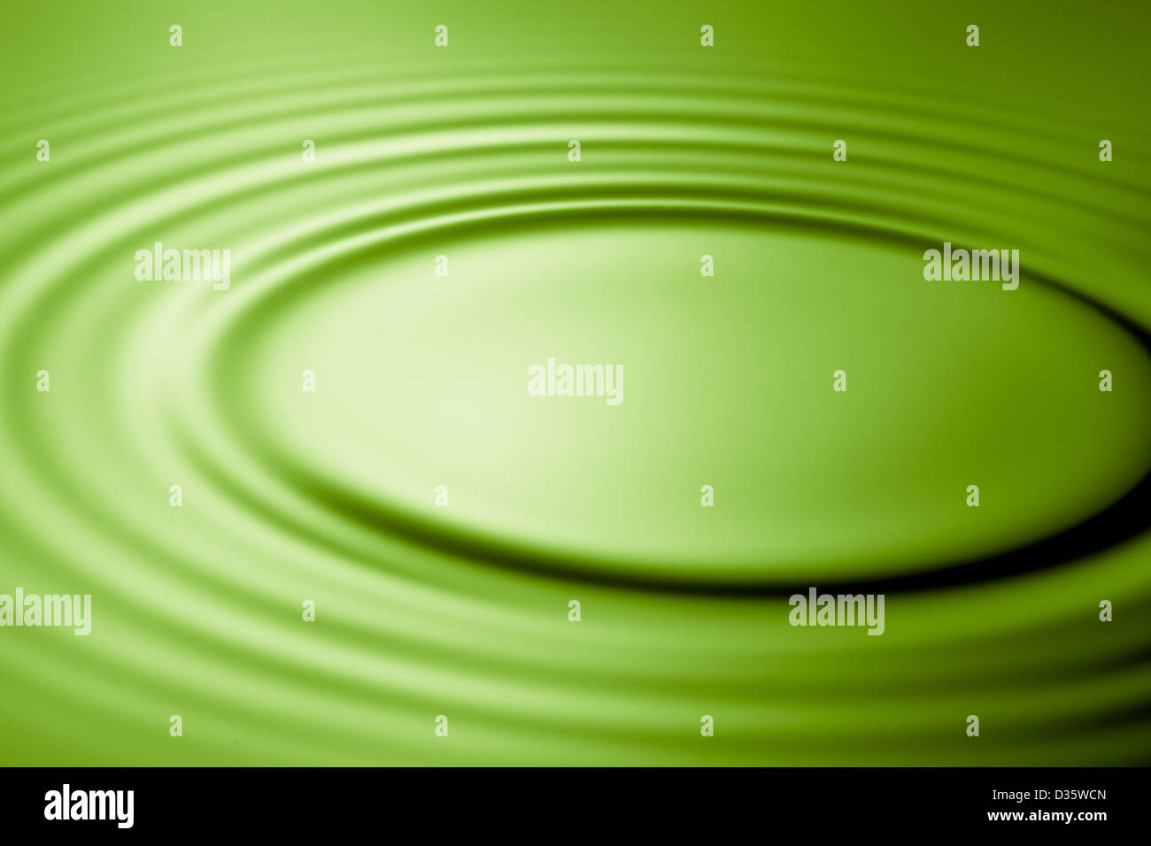 Green ripple in water Stock Photo - Alamy