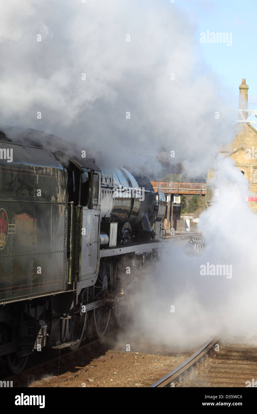 Steam locomotive 46115 Scots Guardsman leaving Carnforth station on a ...
