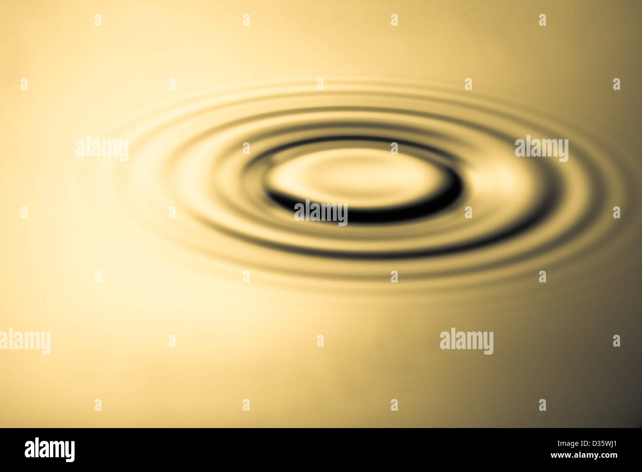 Yellow ripple effect Stock Photo - Alamy