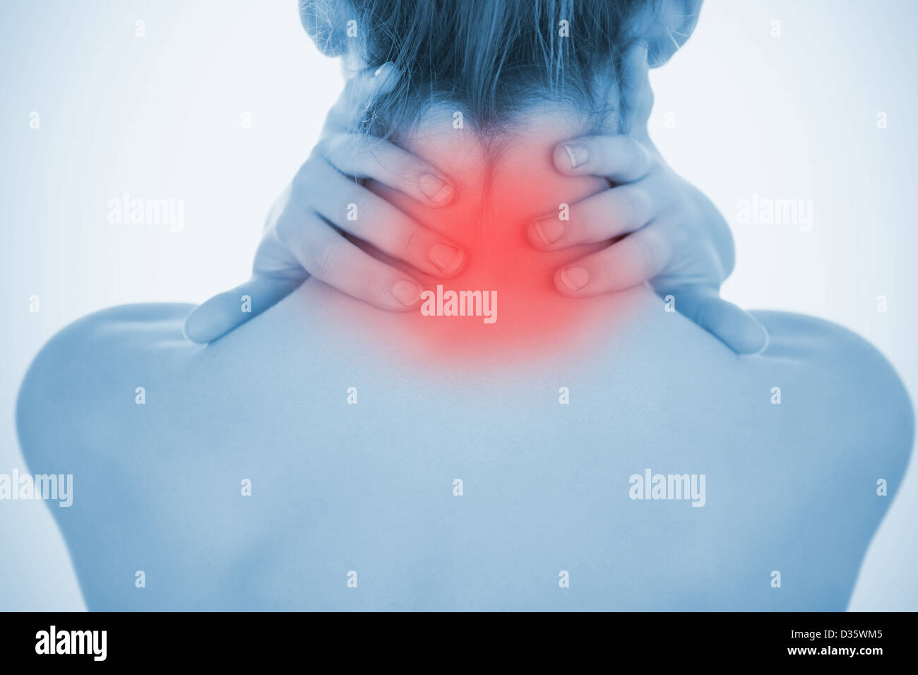 Woman rubbing highlighted neck pain Stock Photo - Alamy