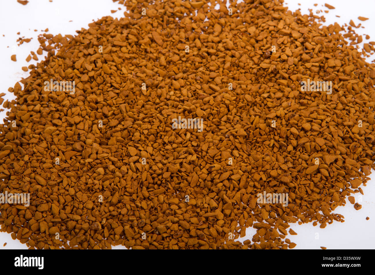 Coffee grains on the white. coffee powder on the white background Stock ...