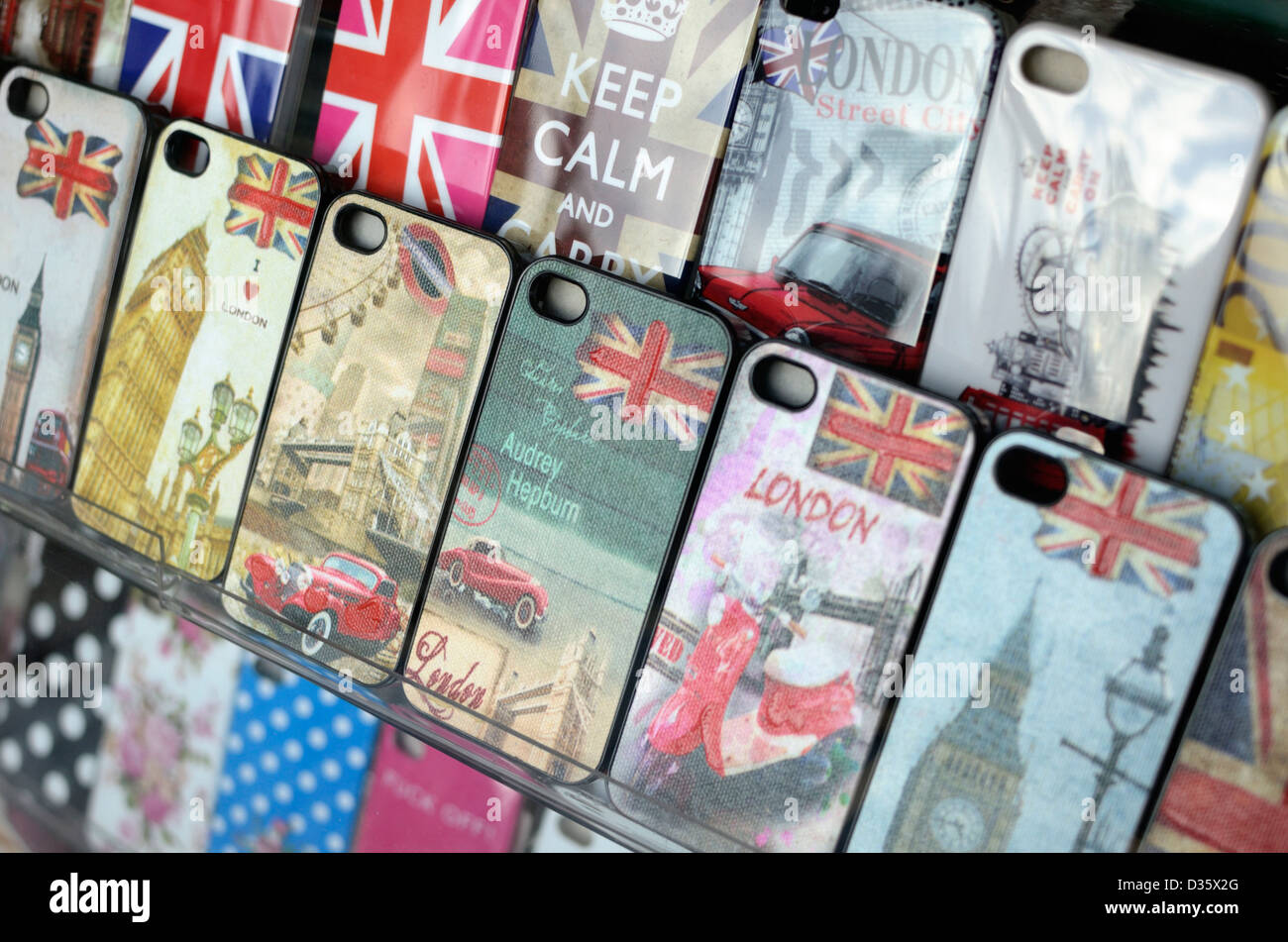 British souvenir mobile phone covers on display in a London shop window ...