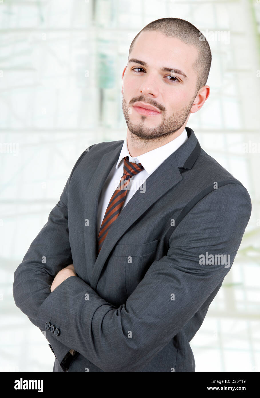 young business man portrait at the office Stock Photo - Alamy