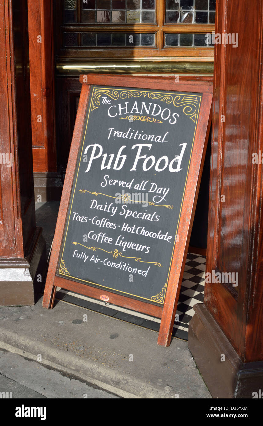 A board advertising pub food outside the Chandos pub in St Martin's ...