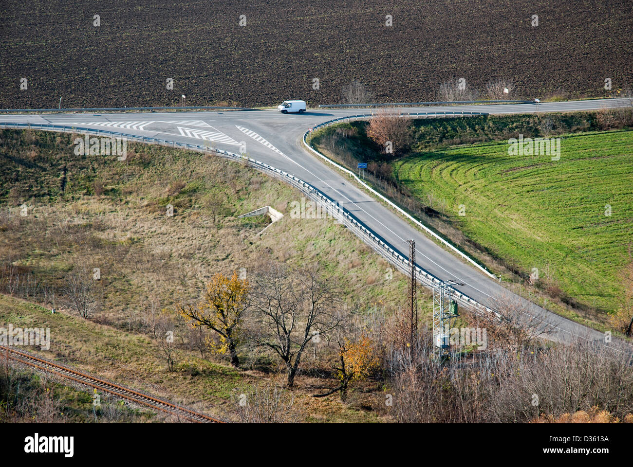 Infrastructure. Junction of roads, railway and wiring Stock Photo - Alamy
