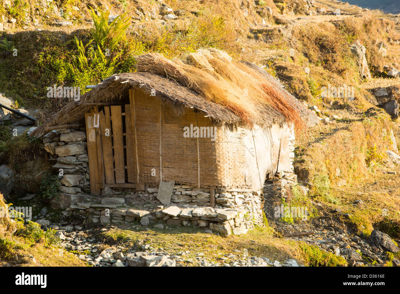 An old traditional corn mill being powered by hydro in the Annapurna ...